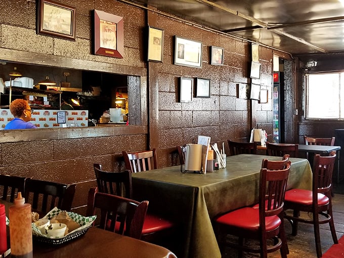 Classic barbecue joint seating where conversations flow as smoothly as the sweet tea refills.