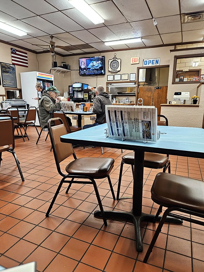 Where conversations flow as freely as the coffee. Notice the menu holders &ndash; no QR codes necessary in this timeless space.