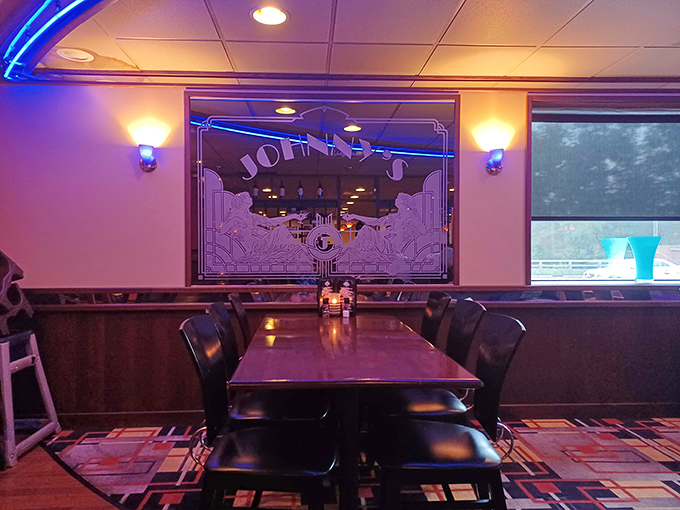 The etched glass divider and cozy booth create that perfect "our spot" feeling that neighborhood favorites are built on.