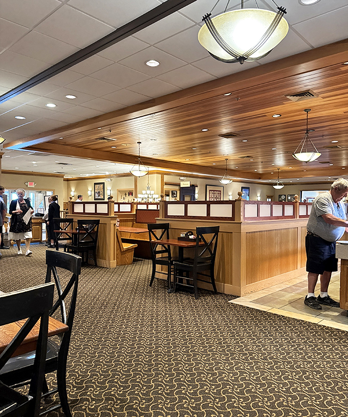 The dining room hums with the satisfied murmurs of patrons who've just discovered what real country cooking tastes like.