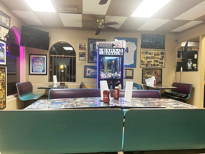 The dining area feels like a Chicago sports museum where food happens to be served. Every wall tells stories of Cubs heartbreak and Bears triumph.