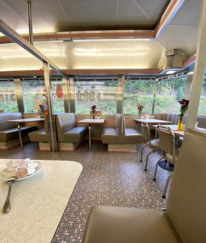 Classic diner booths&mdash;where strangers become neighbors and breakfast decisions become the day's most important achievement.