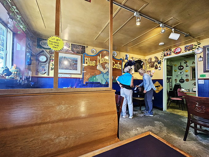 The dining area feels like someone's quirky living room that happens to serve incredible food. Those wooden booths have heard decades of local gossip.