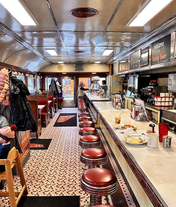 The counter view&mdash;where breakfast dreams are made and coffee cups are never empty. Pure diner poetry in motion.