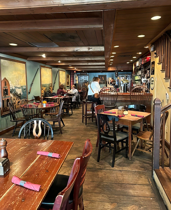The dining room whispers stories of centuries past while serving food worth writing home about. These wooden chairs have supported patriots, pirates, and hungry modern-day adventurers. 