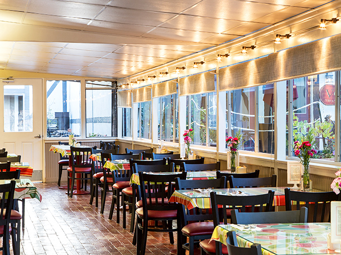 Sunlight streams through windows in the dining area, creating the perfect backdrop for pastry-fueled conversations and coffee-inspired epiphanies.