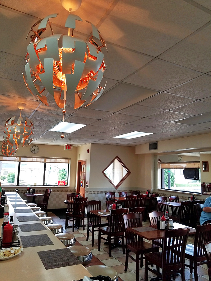 Those sphere-shaped light fixtures add just enough personality without trying too hard &ndash; breakfast spots should feel comfortable, not stuffy.