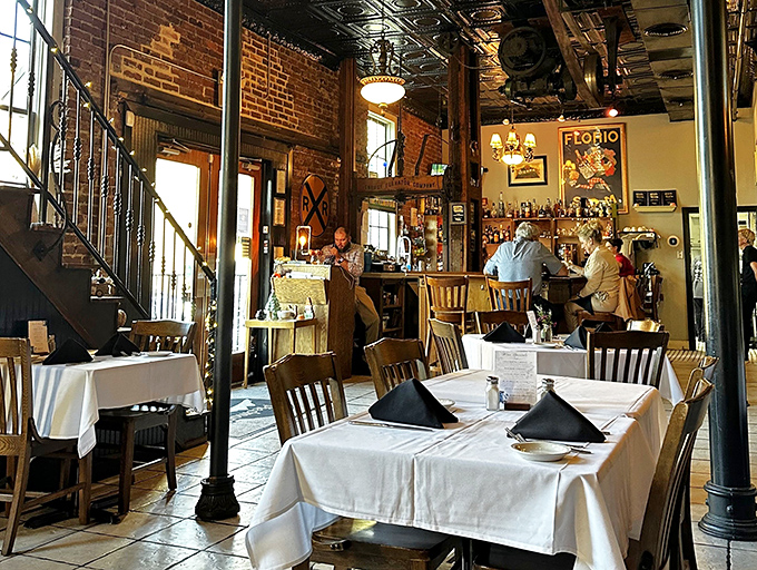The dining room feels like a secret club where the password is "good taste"&mdash;white tablecloths signal serious food in a space that never takes itself too seriously.