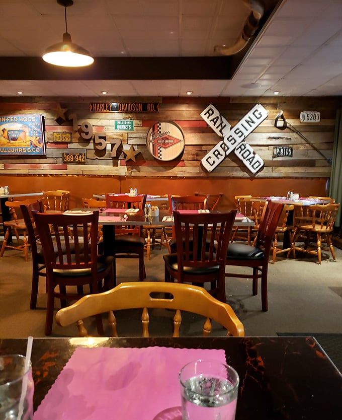 The dining room wall tells stories through vintage signs and memorabilia&mdash;each one a conversation starter better than any dating app icebreaker.