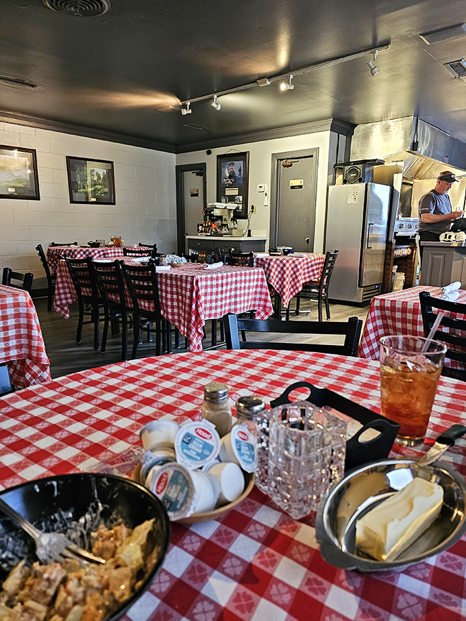 The dining room isn't selling atmosphere; it's selling anticipation. Those empty tables will soon host memories that last longer than the meal.