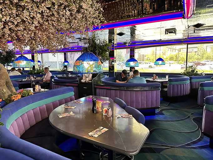 Those circular booths create intimate dining spaces where conversations flow as smoothly as the perfectly prepared hollandaise sauce nearby.