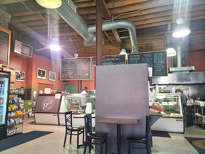 Industrial chic meets comfort food haven. The exposed ductwork watches over diners like guardian angels of good eating.