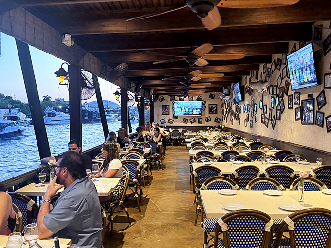 Dining with a view that turns every meal into an occasion&mdash;boats gliding by as if choreographed for your entertainment.