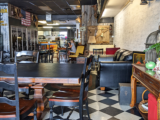 The eclectic dining area feels like your coolest friend's living room, if that friend happened to be obsessed with barbecue and had impeccable taste in vintage furnishings.