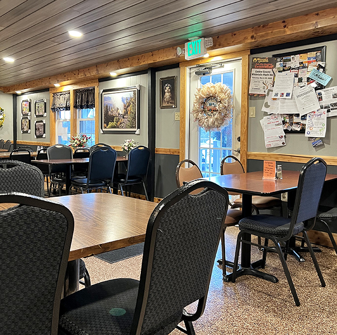 The dining area balances rustic charm with small-town practicality. Those community bulletin boards hold the real social media of rural Pennsylvania.