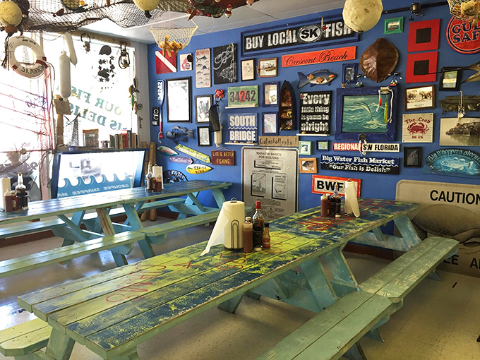 The turquoise picnic tables aren't just furniture; they're stages where seafood performances receive standing ovations from satisfied diners.