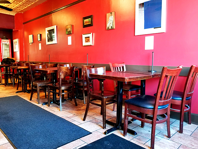 Simple wooden tables and chairs that say, "Don't worry about your outfit—focus on the food and the conversation it inspires."