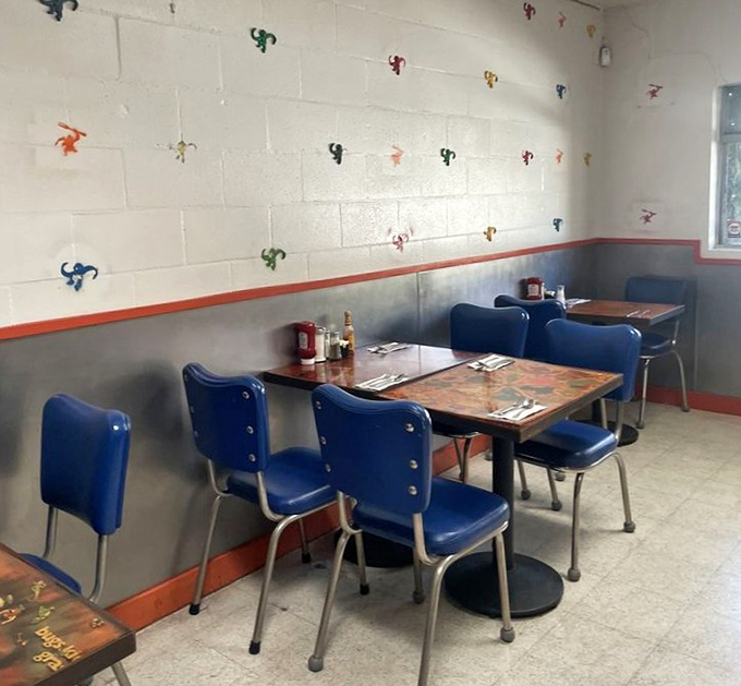 Colorful monkey art watches over diners like playful guardians. Even the walls know you're in for something special here.