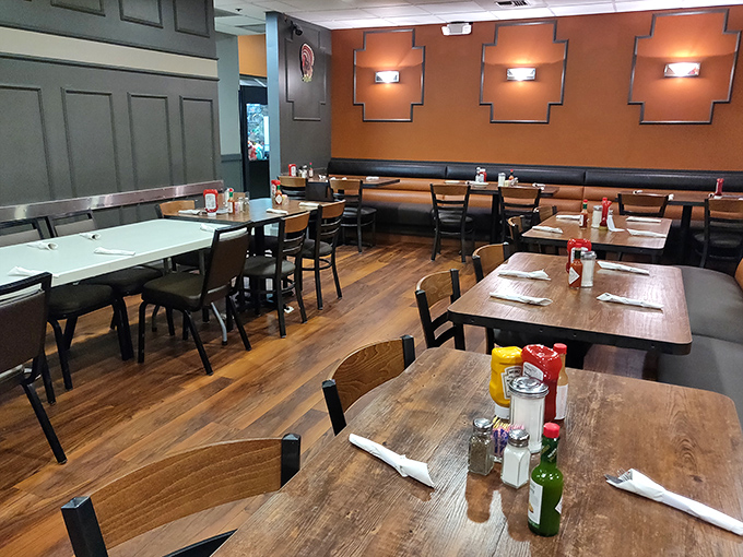 The dining room waits patiently for its next round of hungry guests. Those wooden tables have heard decades of stories.