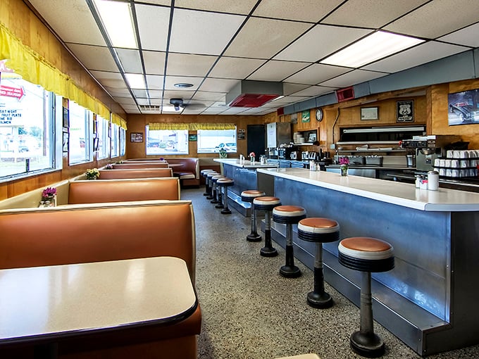 The counter and booth section offers that perfect diner experience where regulars have their "spots" and the coffee's always fresh.