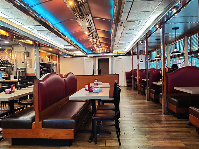 Red vinyl booths, polished chrome, and ceiling lights that flatter everyone&mdash;this dining area has witnessed first dates, family celebrations, and countless "just one more coffee" moments.