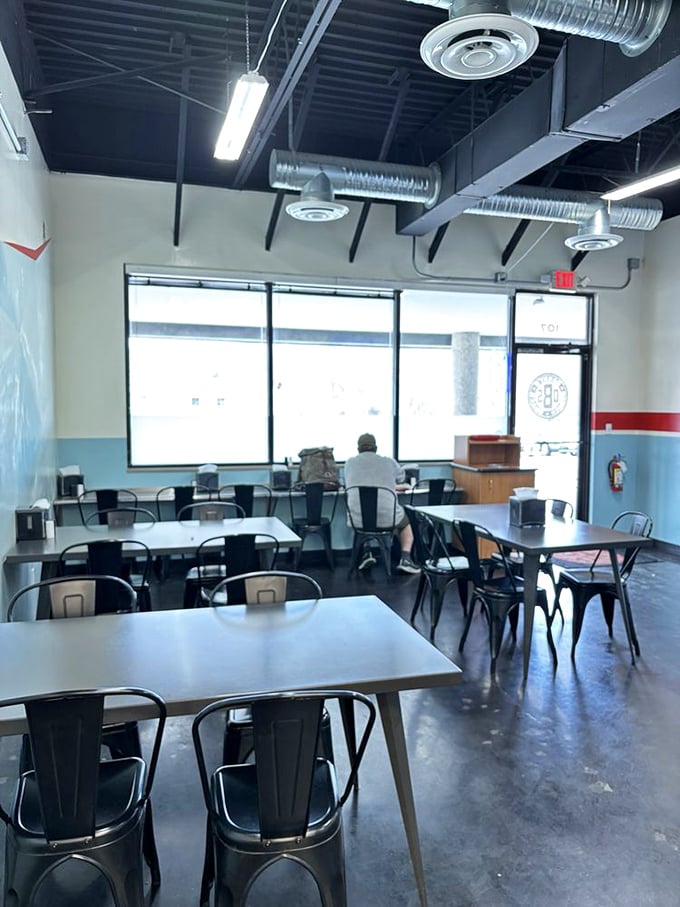 The dining area's industrial-chic simplicity sends a clear message: we're not here for the d&eacute;cor, folks. We're here for food that makes your taste buds do backflips.