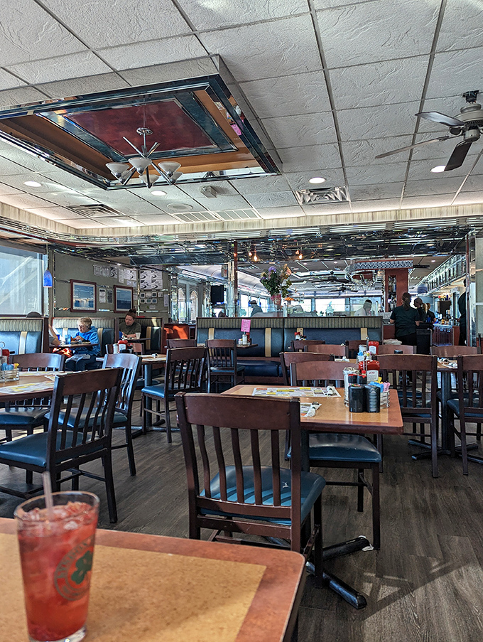 The dining room hums with conversation and silverware clinks—a symphony of satisfaction conducted under vintage ceiling fixtures that have witnessed countless celebrations.