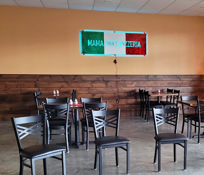 The dining area speaks the universal language of "come, sit, eat." Those Italian flag colors aren't just decoration&mdash;they're a promise.