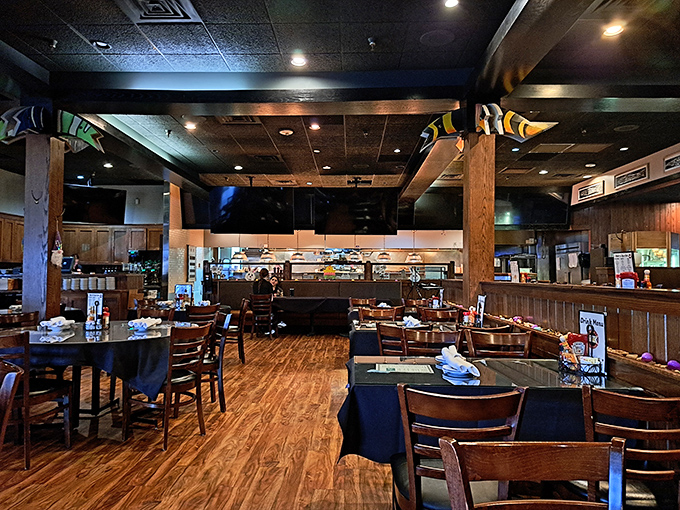 Wooden beams, colorful fish sculptures overhead&mdash;the dining room balances nautical touches with Midwestern warmth in perfect harmony.
