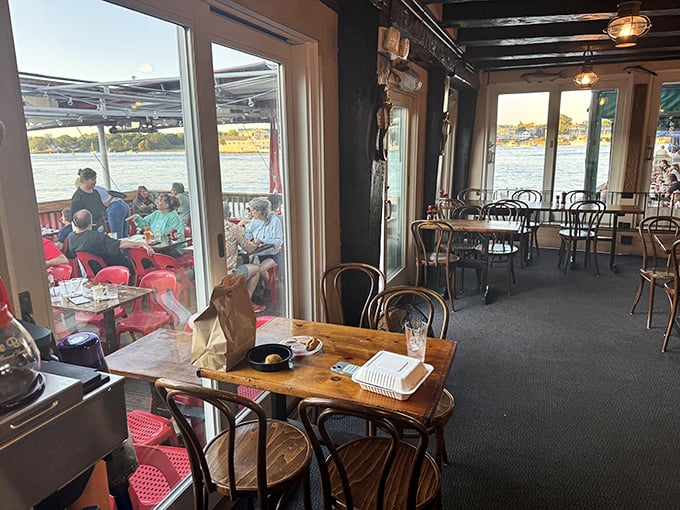 The indoor dining area offers the same spectacular views minus the seagulls eyeing your food. A cozy retreat when New England weather turns fickle.