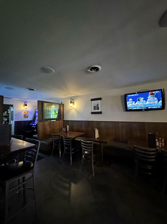 The dining area offers a cozy retreat with wood paneling and soft lighting&mdash;the perfect backdrop for serious wing consumption.