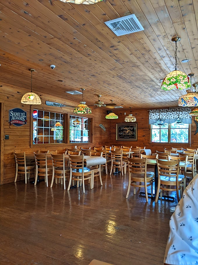 Wooden walls, stained glass pendant lights, and tables awaiting hungry guests&mdash;this dining room practically whispers "seafood memories will be made here."