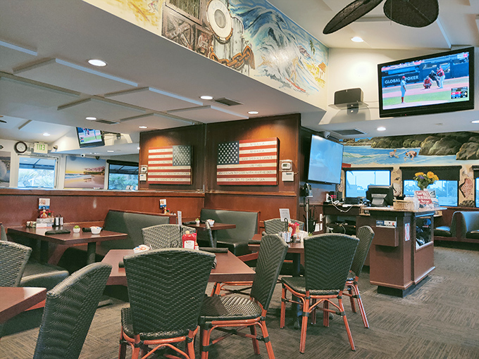 The dining area isn't just tables and chairs&mdash;it's a community gathering spot where American flags remind you that breakfast patriotism is real.