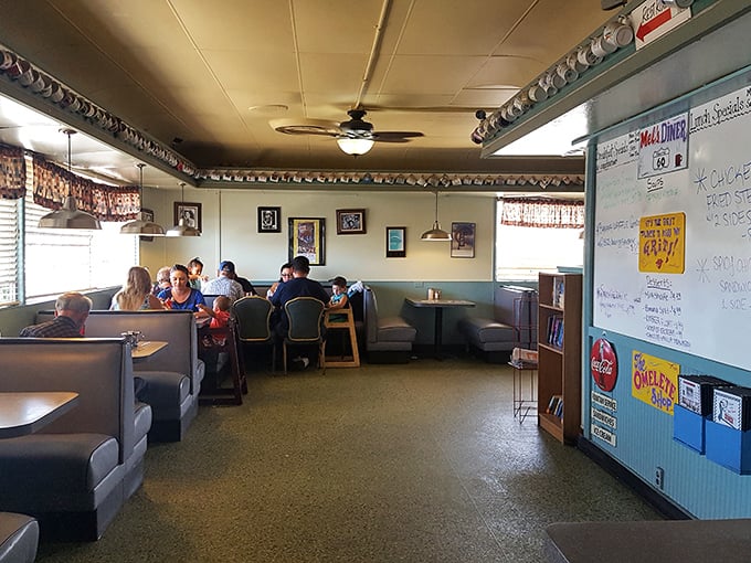 The dining area at Mel's: where strangers become neighbors and calories don't count if you're having a good conversation.