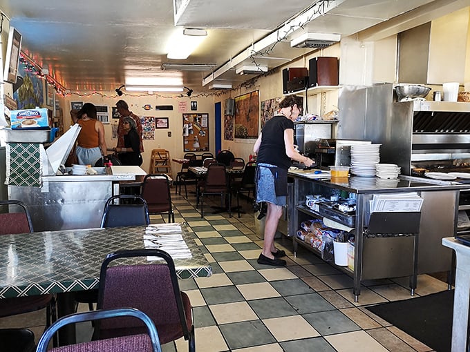 No-frills dining area where the focus stays squarely on the food. Those checkered floors have witnessed countless "first bite" expressions of pure joy.