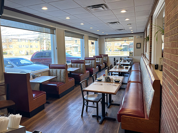 Where breakfast dreams come true under wooden beams. The colorful walls and thoughtful layout create conversation pockets for regulars and newcomers alike.