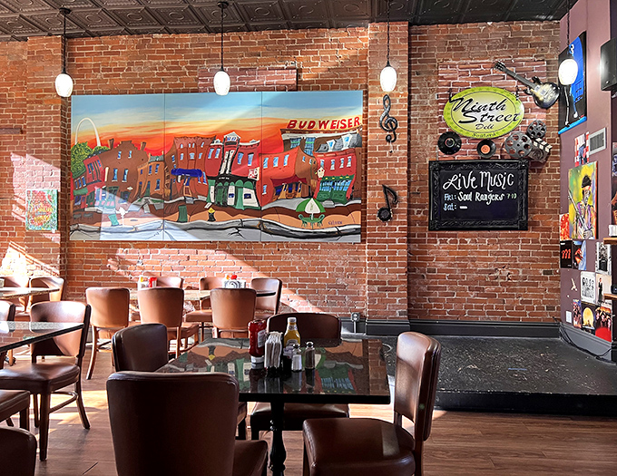 Exposed brick walls and local artwork create the perfect backdrop for sandwich worship, where every table feels like the best seat in the house.