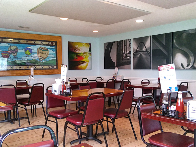 The dining area's stained glass and artsy walls create an atmosphere somewhere between small-town charm and hipster hangout.