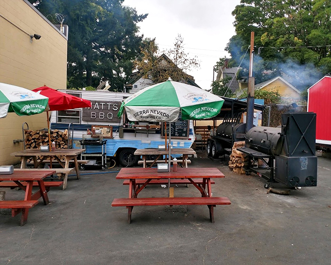 Picnic tables: where strangers become friends united by sticky fingers and meat sweats. The best conversations happen over trays of BBQ.