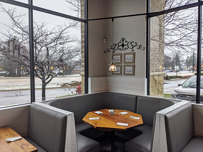 Corner booths: where breakfast dreams and intimate conversations happen, framed by windows that invite the outside world to peek in.