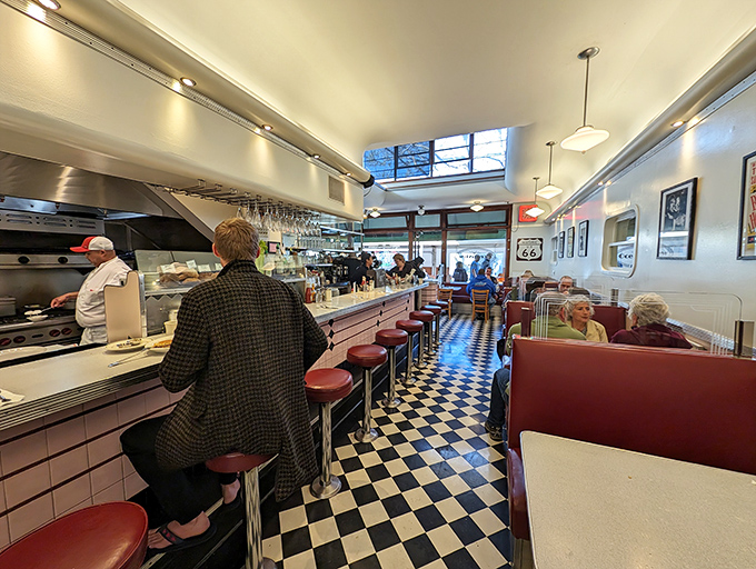 Counter seats: the VIP section of diner culture. Front-row tickets to the breakfast ballet, where every plate tells a story.