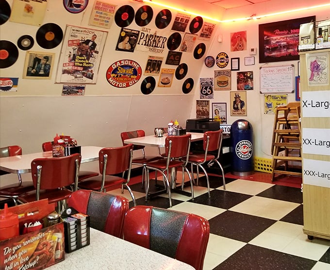 Classic diner charm with checkerboard floors and vinyl records&mdash;where every table feels like the best seat in the house.