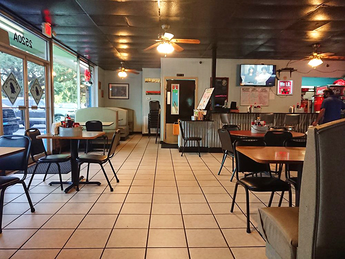 The dining area's tile floors and ceiling fans create the perfect backdrop for the real stars: whatever's about to arrive on your plate.