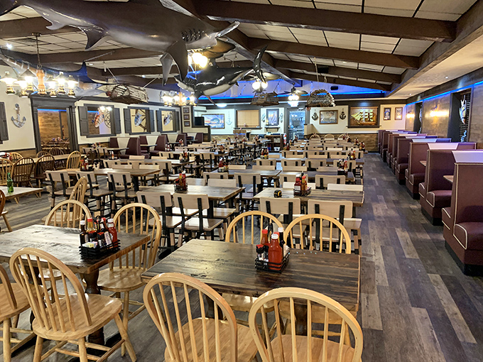 The dining room where strangers become friends united by the universal language of "pass the melted butter, please."