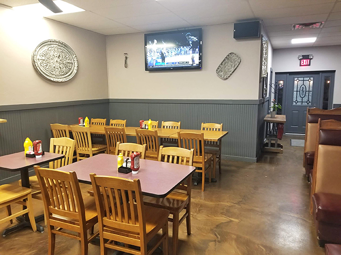 The dining area's simple charm invites you to linger, where every table feels like the best seat in the house.