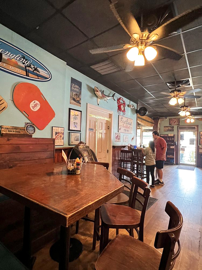 Coastal blues and weathered wood create the perfect backdrop for memorable meals&mdash;no interior designer needed, just decades of beach town authenticity.