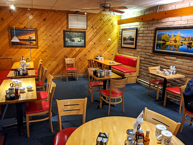 Wood-paneled walls adorned with Teton landscapes&mdash;because sometimes your eyes need feeding as much as your stomach.