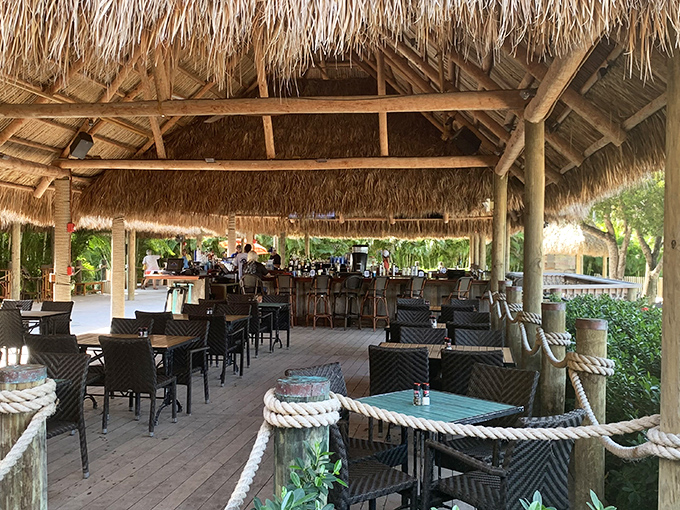 Thatched roof, tropical breeze, and tables waiting for memories to be made&mdash;dining doesn't get more quintessentially Keys than this.
