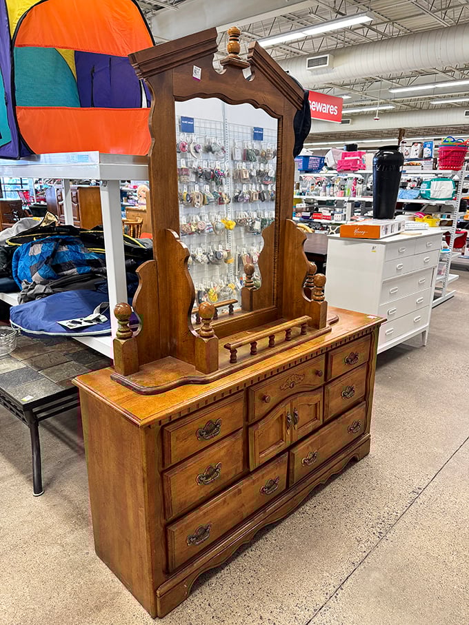 This vintage dresser with mirror isn't just furniture—it's a time machine to grandma's bedroom, waiting for its next chapter in your home.