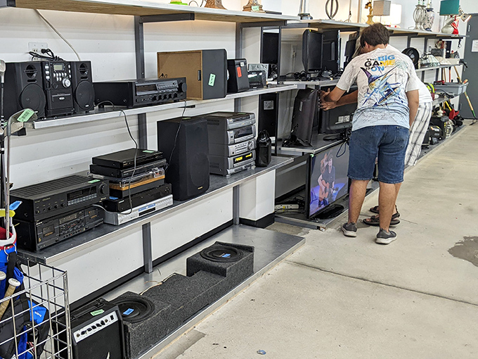 The electronics section is a museum of technological evolution where vintage stereos remind us of the days when "streaming" meant adjusting the antenna.